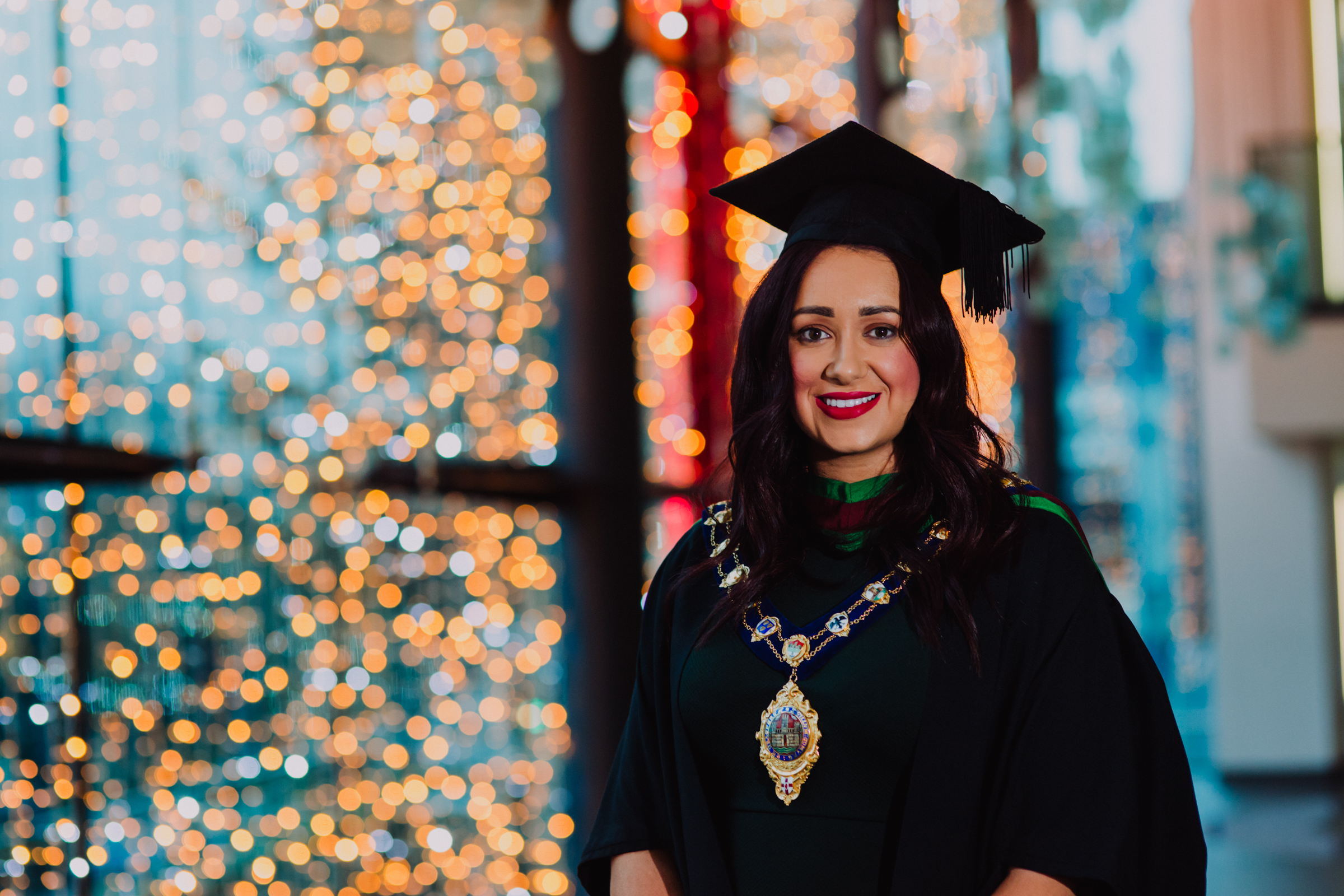 Ulster University student swaps mayoral robes for graduation gown