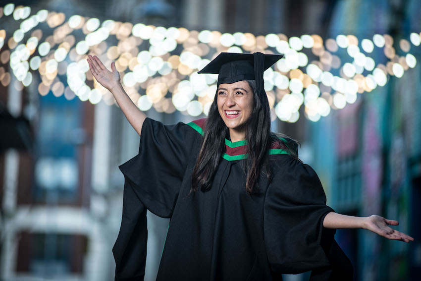 Inspirational international student graduates with distinction